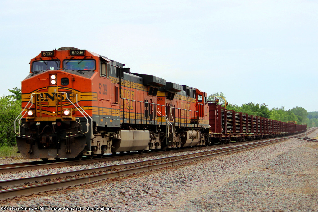 BNSF 5139 leads this wb rail train at 35mph.